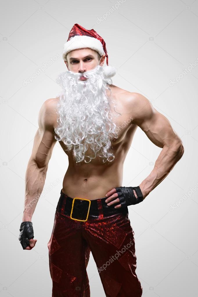 Muscular handsome sexy Santa Claus — Stock Photo © Sheikoevgeniya #88396734 Muscular handsome sexy Santa Claus — Stock Photo © Sheikoevgeniya #88396734