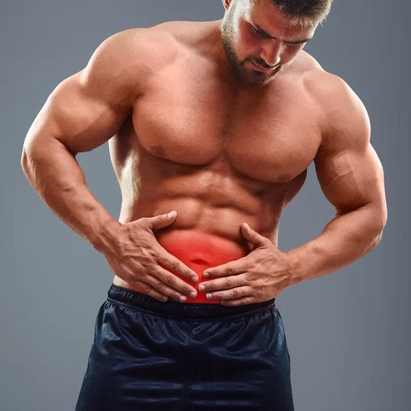 Ahtletic muscle man Stomach ache - Stock Image - Everypixel