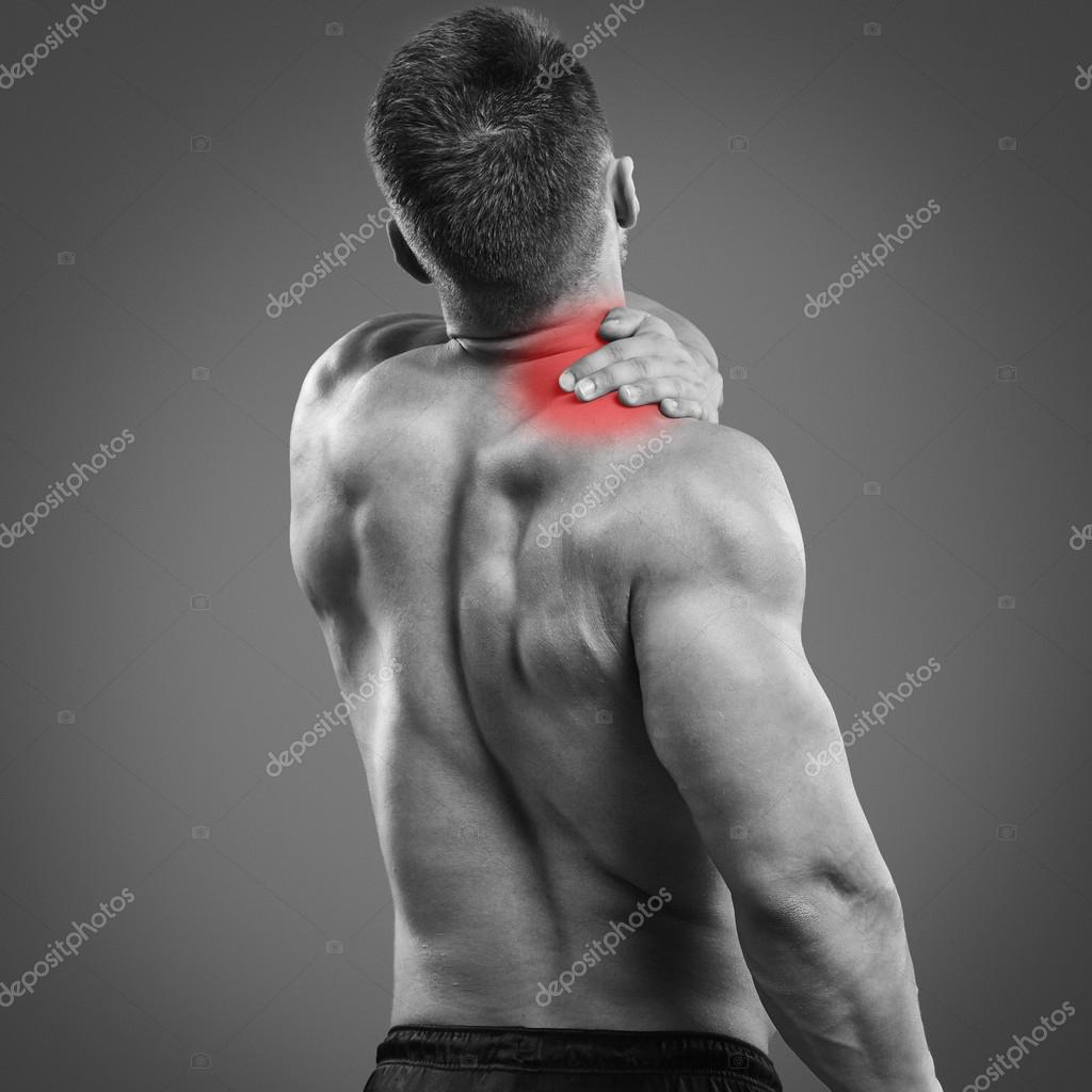 Muscular man Back Neck pain Stock Photo by ©kegfire 97586384