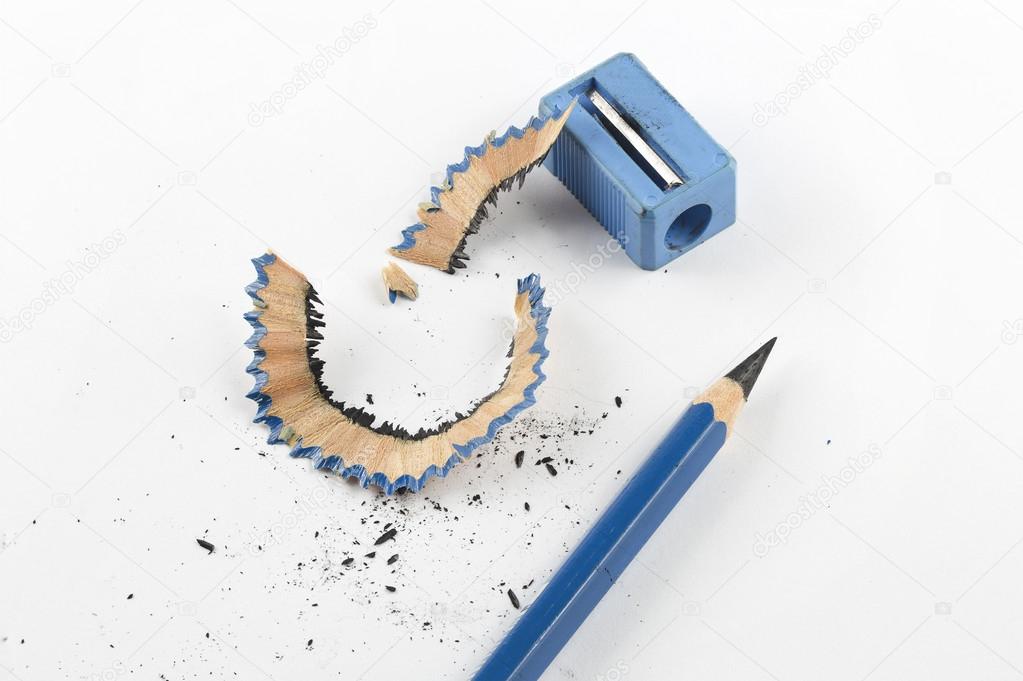 Sharp pencil with sharpener and shavings — Stock Photo © skasiansin ...