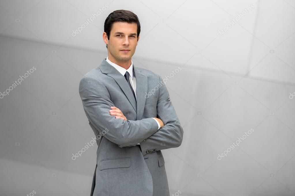 Strong handsome confident business man portrait posing with successful ...