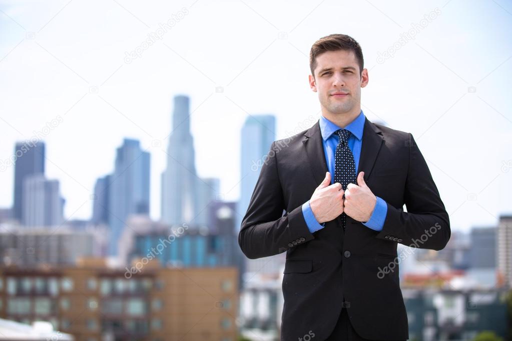 Confident businessman in a suit standing tall and proud attorney ...