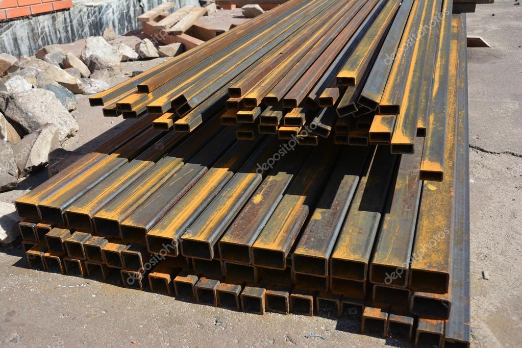Steel beams for roofing.Rust steel channel bunch on house construction ...