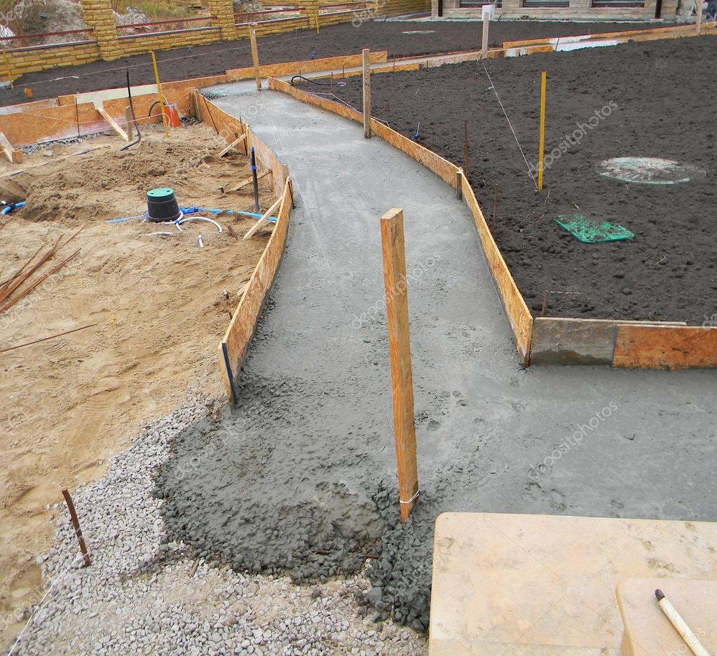 Building new concrete pavement in the garden. Stock Photo by ...