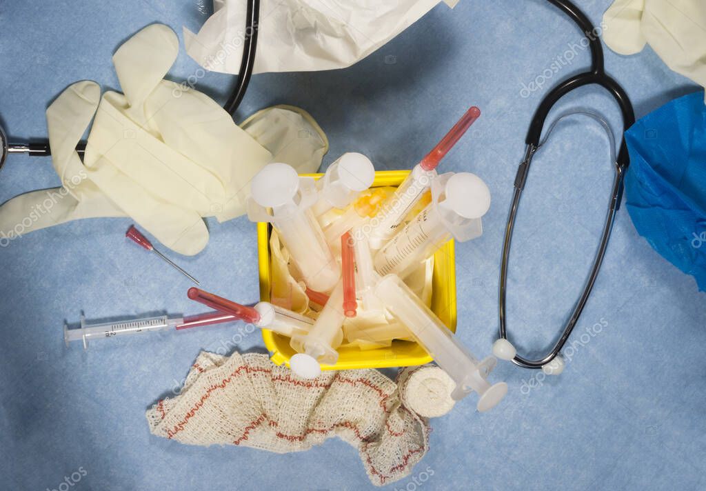 Overhead view of a sanitary still life centered on a biological ...