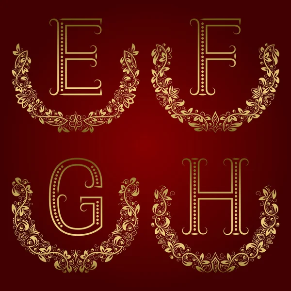 Vintage monograms set of E letter. Golden heraldic logos in wreaths ...