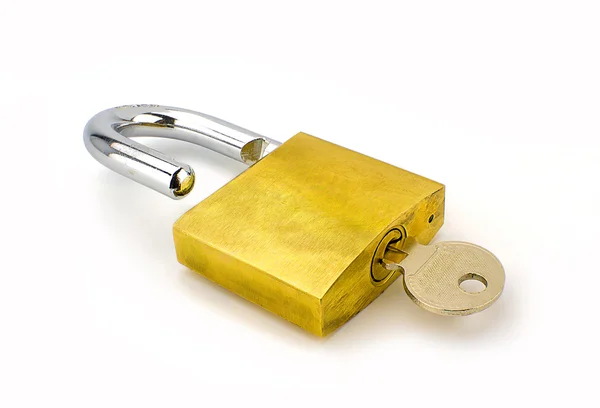 Unlocked padlock with the key on white background Stock Photo by ...