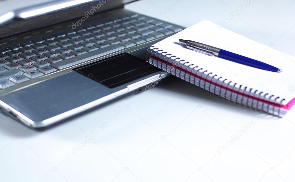 Office table with blank notepad and laptop Stock Photo by ©lenecnikolai ...