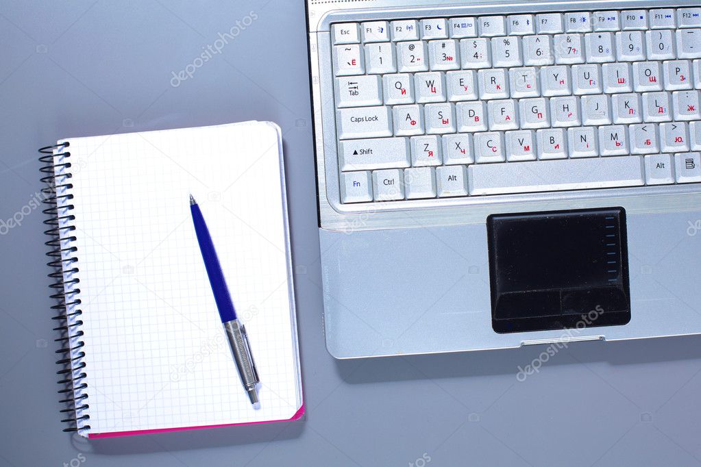 Office table with blank notepad and laptop — Stock Photo © lenecnikolai ...