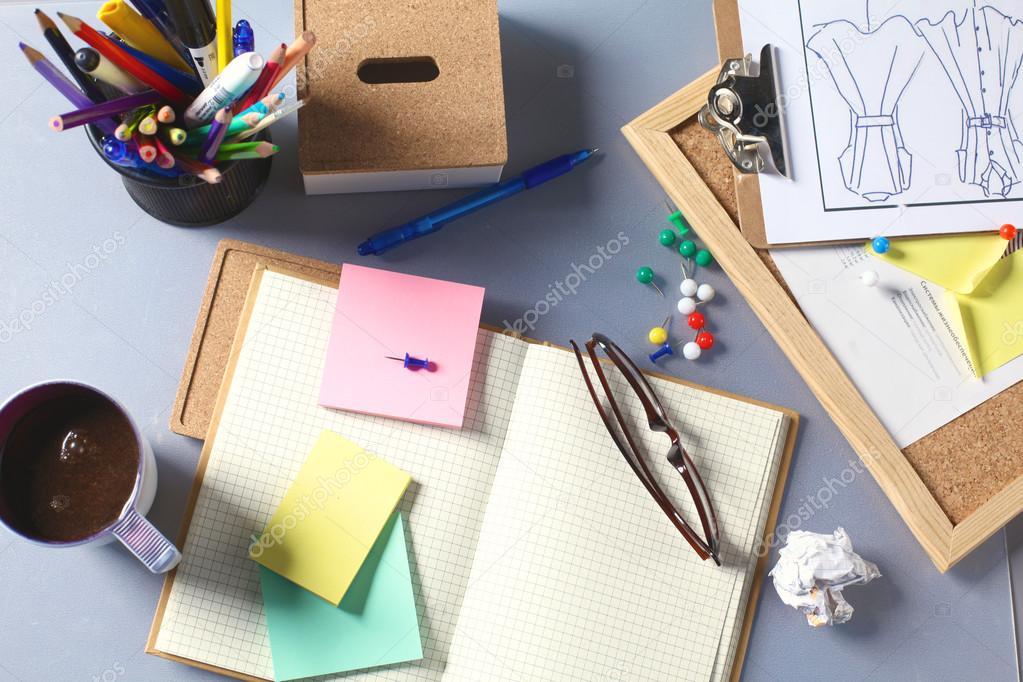 Office table with blank notepad and laptop Stock Photo by ©lenecnikolai ...