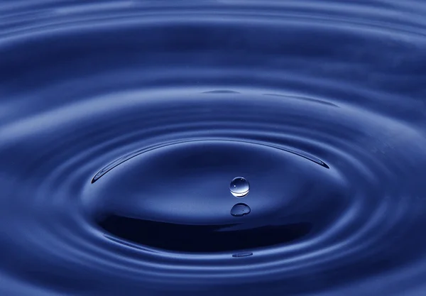 Red Water Splash Stock Photo by ©AGCreativeLab 80527356