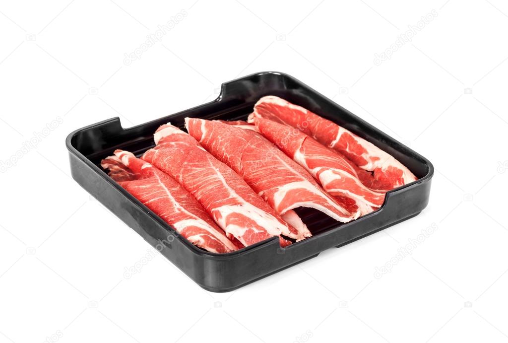 Beef sliced in tray isolated on white background Stock Photo by ...