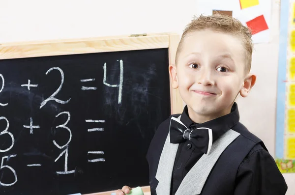 Young student at the blackboard Stock Photo by ©5nikolas5 78522770