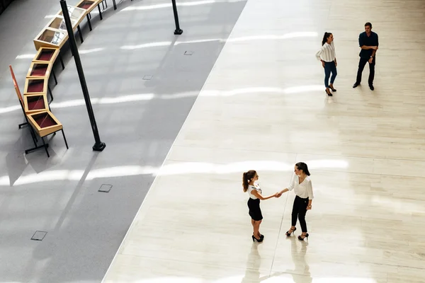 Young business people before starting work - Stock Image - Everypixel