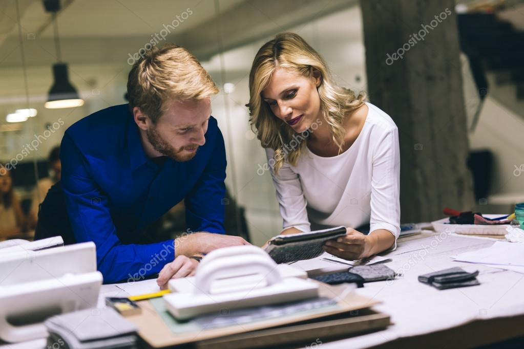 Two designers talking Stock Photo by ©nd3000 84683358