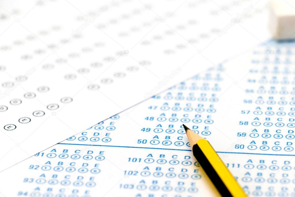 Answer sheets on table Stock Photo by ©lamaip 101778554