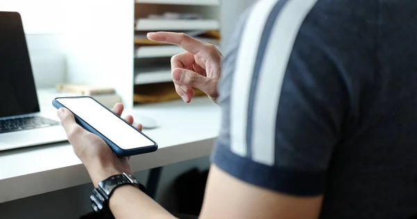 Mock up smartphone of hand holding black mobile phone with blank white ...