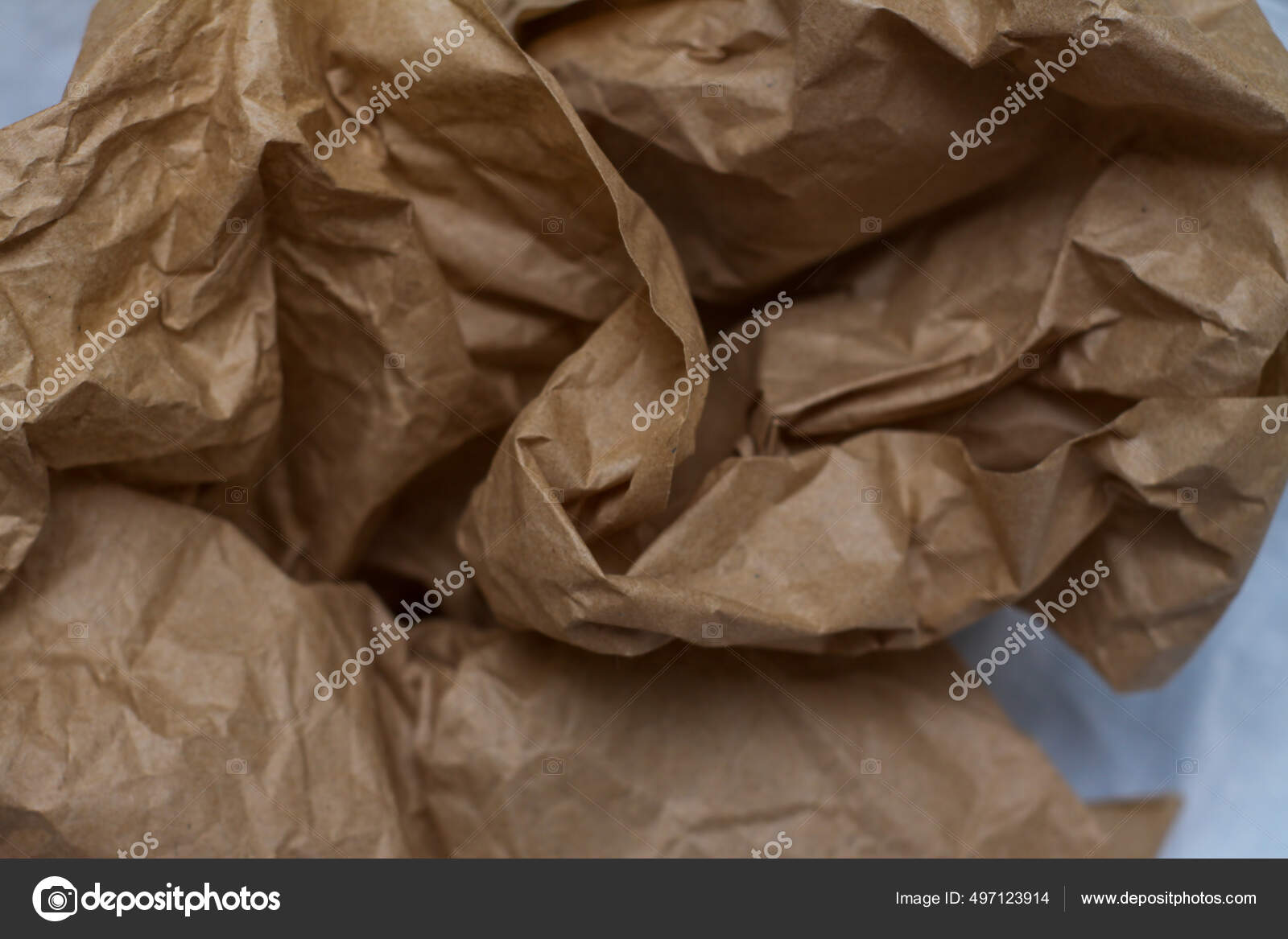 Crumpled paper. craft paper. texture, background, folds.brown crumpled ...