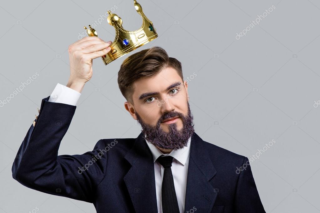 Man holding golden crown over his head — Stock Photo © VelesStudio ...