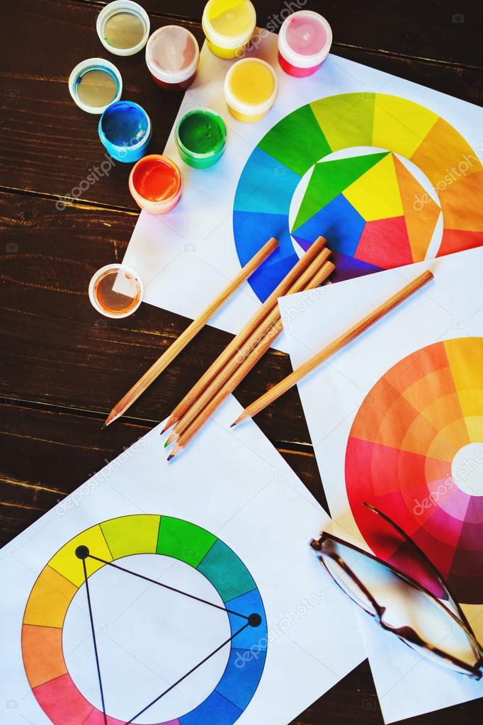 Paints, pencils, drawings and glasses — Stock Photo © VelesStudio ...