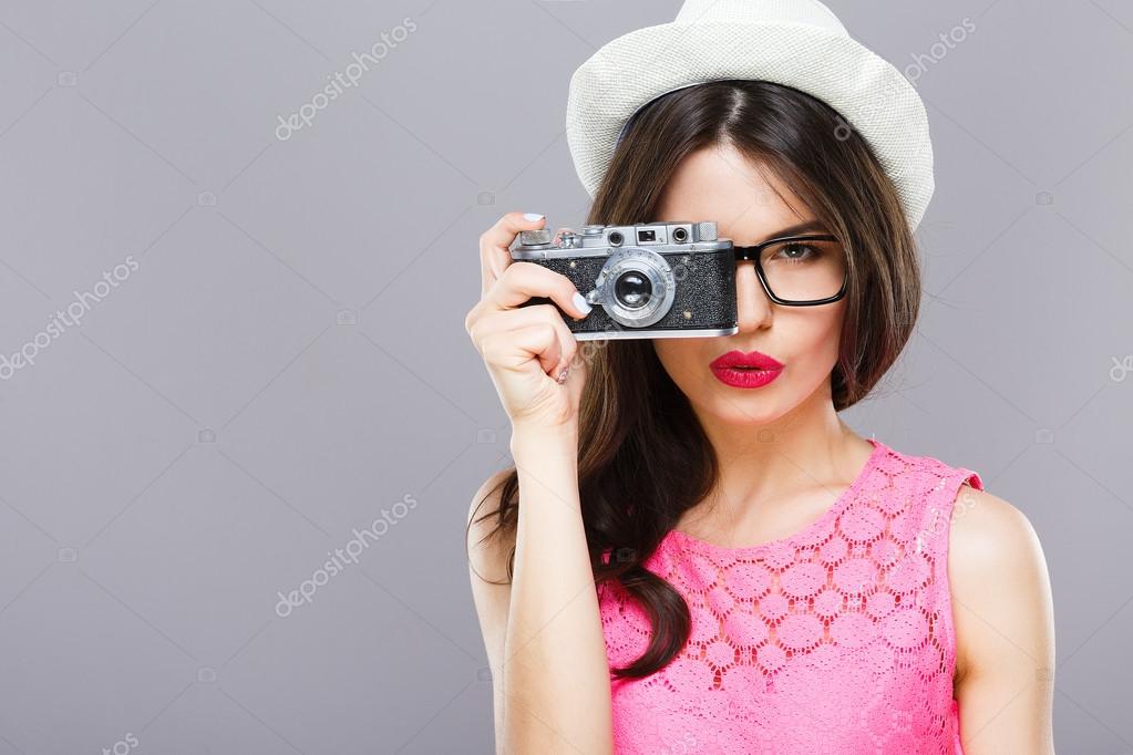 Cute model at studio background Stock Photo by ©VelesStudio 125358038