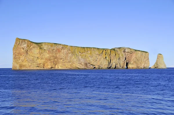 Perce Rock (French rocher Perce, "pierced rock") is a huge sheer rock ...