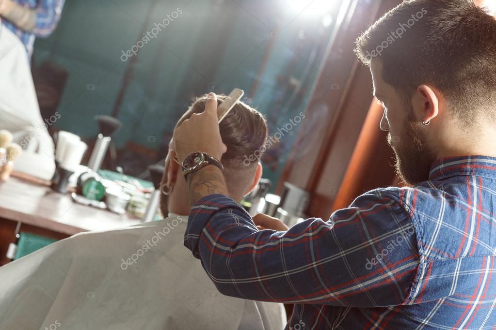 Shaving process in barber shop Stock Photo by ©photo_oles 80684138