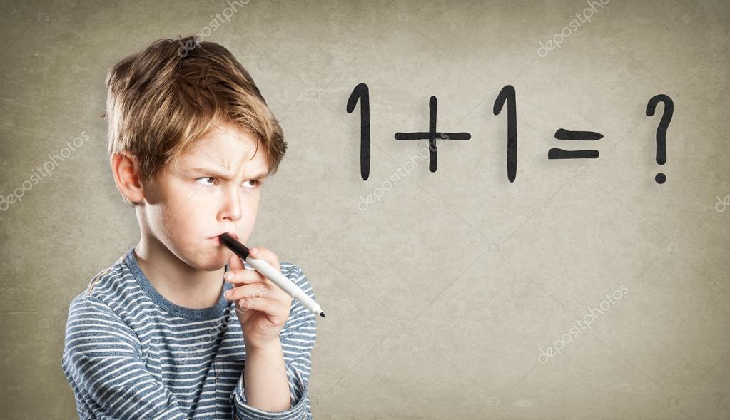 Boy, writing and thinking, trouble with math — Stock Photo © TunedIn61 ...