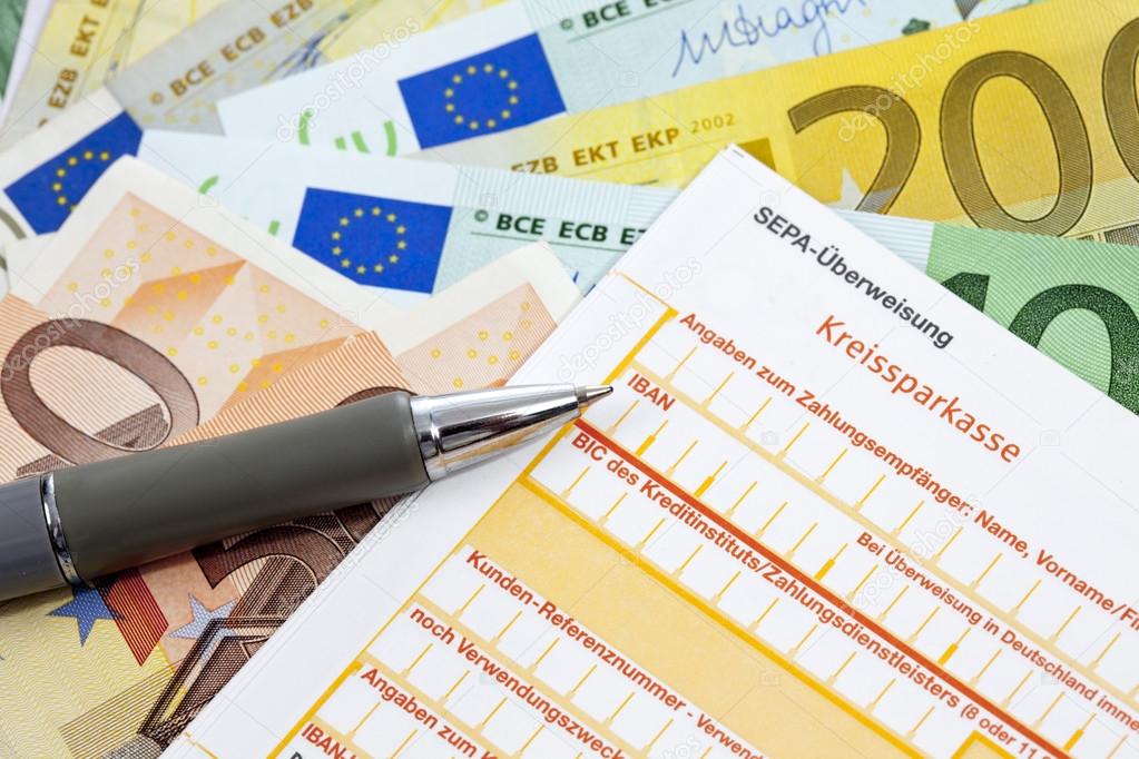 Cheque and pen on heap of euro notes Stock Photo by ©TunedIn61 85067476