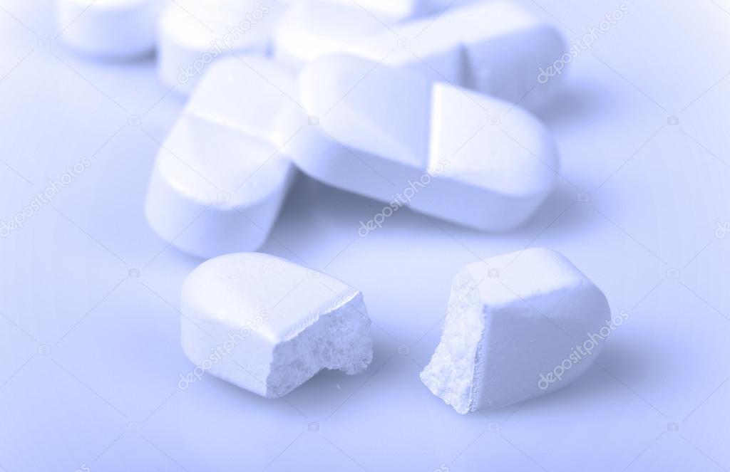 White tablets on white background Stock Photo by ©TunedIn61 85070214