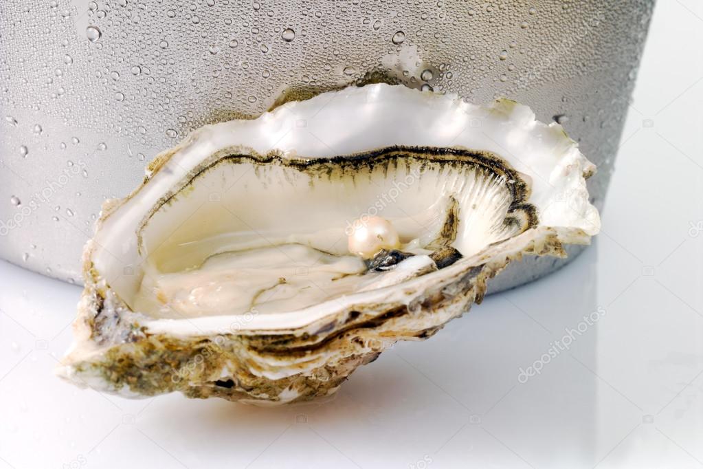 Open oyster with pearl — Stock Photo © TunedIn61 #86091590