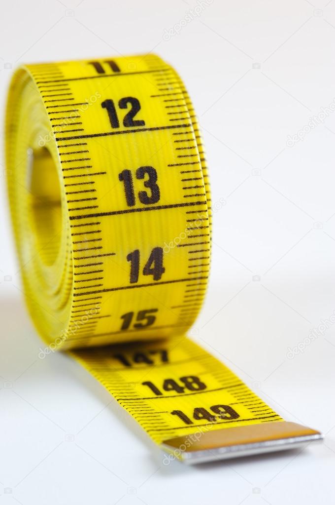 Measuring tape with centimeters rolled up — Stock Photo © TunedIn61 ...