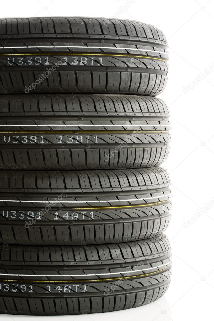 New car tires Stock Photo by ©TunedIn61 88182380