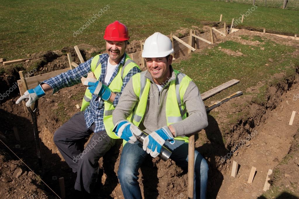 Male construction workers lunch break — Stock Photo © DGLimages #80476354