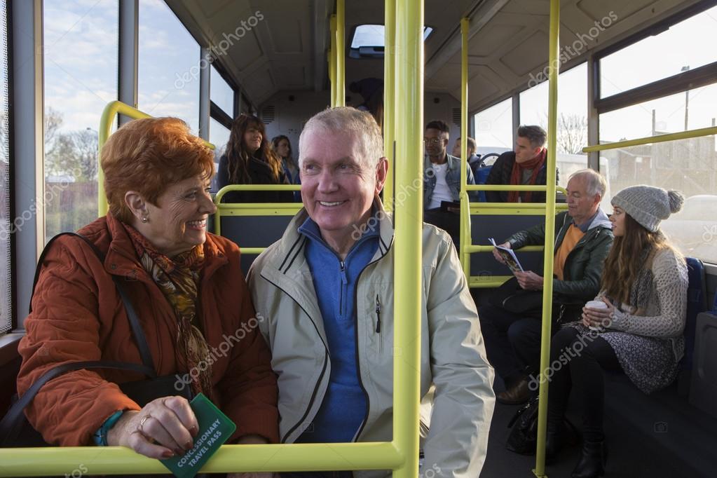 Senior couple on a bus — Stock Photo © DGLimages #80488440