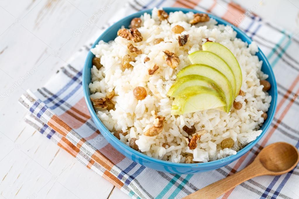 Sweet rice with raisins Stock Photo by ©anaumenko 84293202