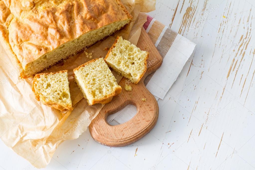 Cornbread squares on paper Stock Photo by ©anaumenko 84299100