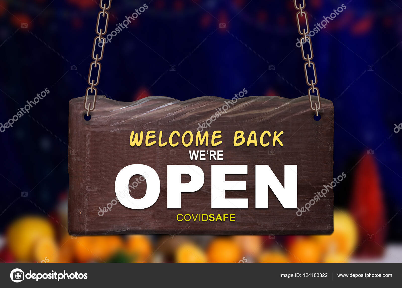 Welcome back we are open sign hanging outside a shop after lockdown ...