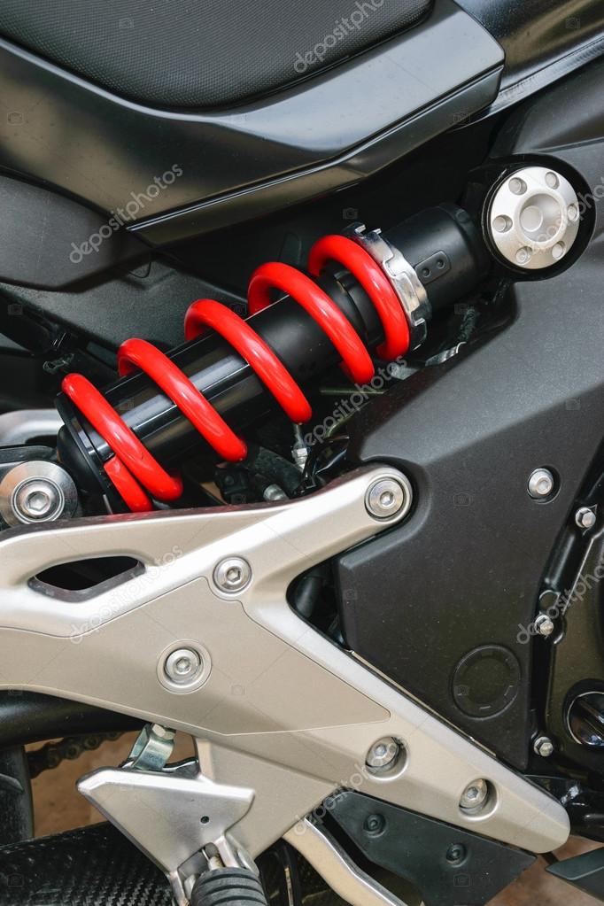 Motorcycle shock absorbers Stock Photo by ©etaphop 82224180