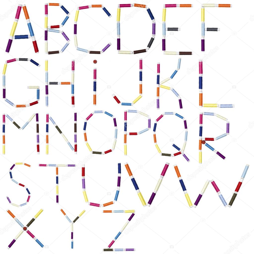 English alphabet made of spool sewing thread — Stock Photo © lord ...