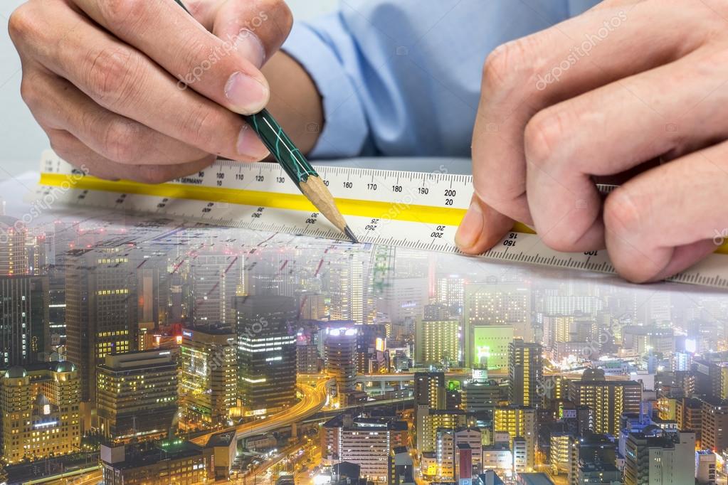 Engineer and drawing paper building whole world — Stock Photo ...