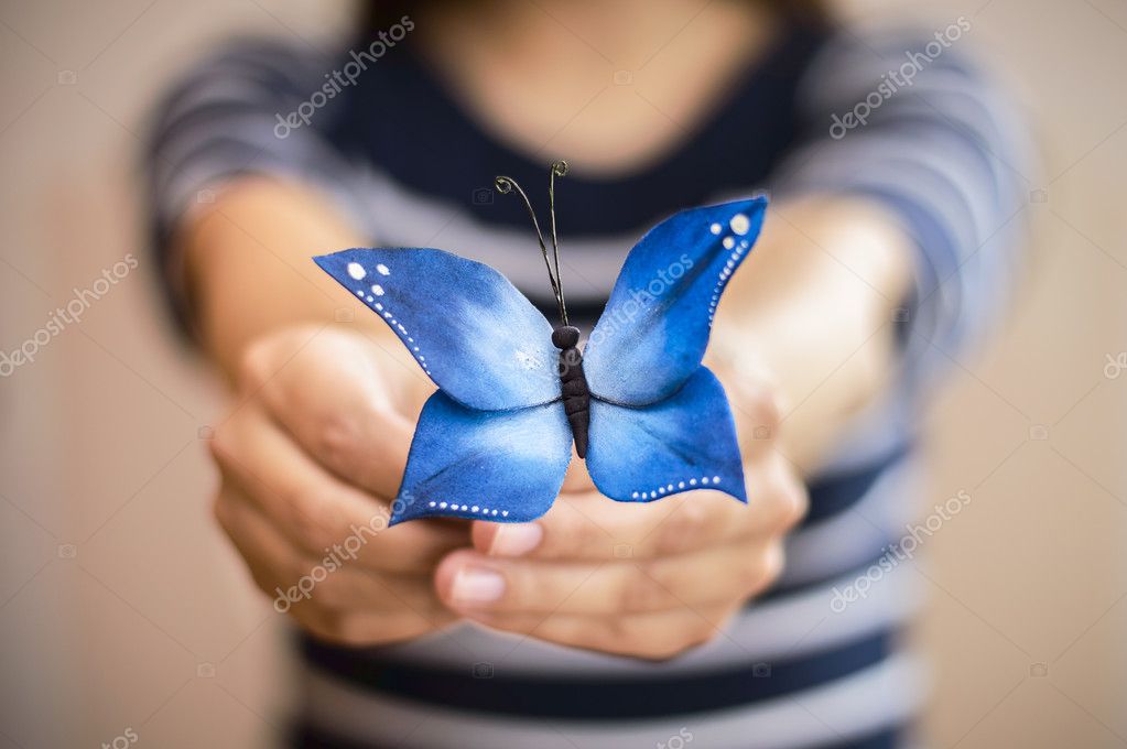 Sugar Blue butterfly in the hands of women — Stock Photo ...