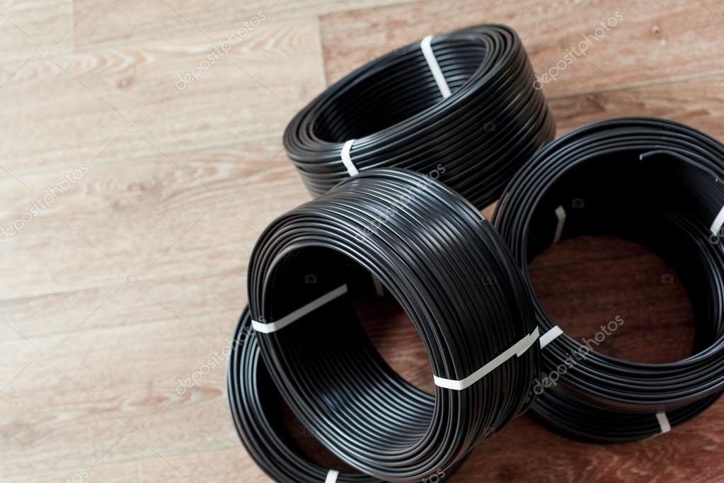 Set of black electric cables Stock Photo by ©Fotofabrika 110635744