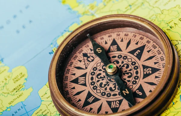 Old compass on the map Stock Photo by ©Fotofabrika 124279282