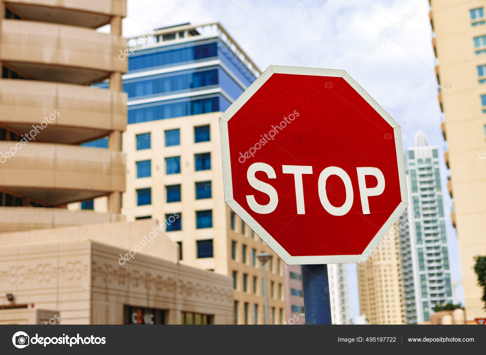 Red stop sign in city close up Stock Photo by ©Fotofabrika 495197722