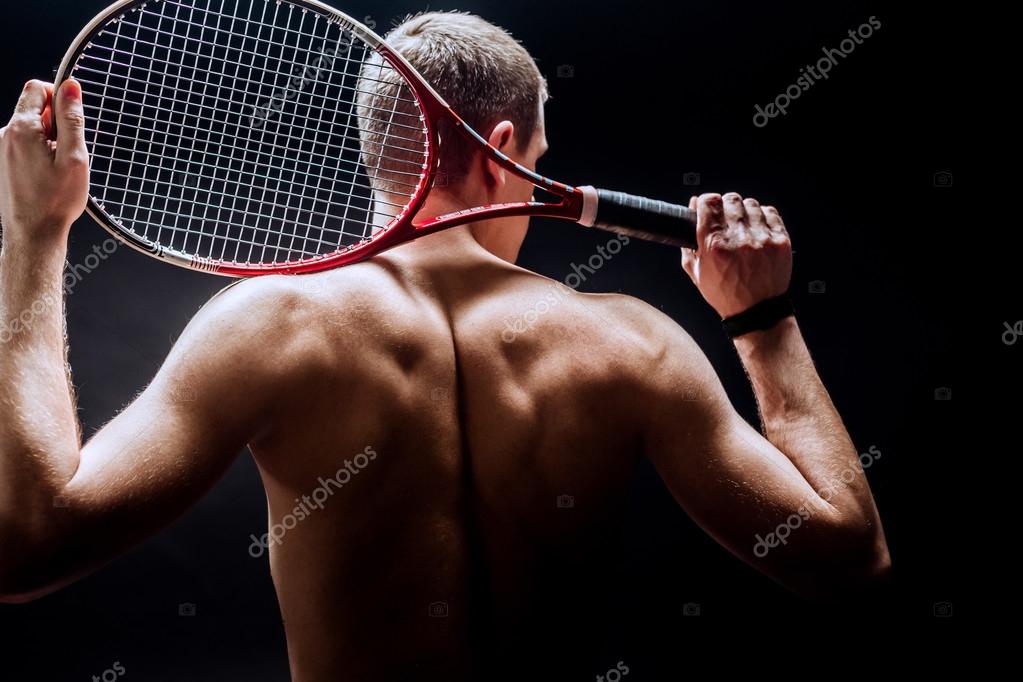 Tennis player on black background. Studio shot Stock Photo by ...