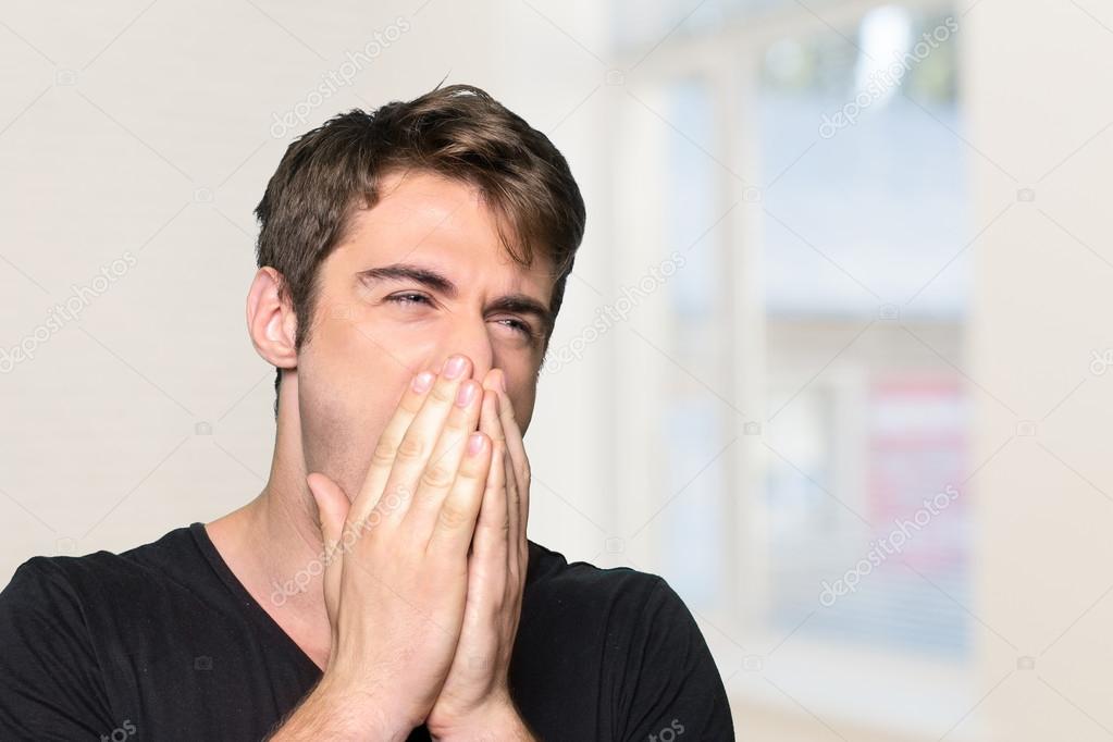 Young man yawning — Stock Photo © Fotofabrika #91349392