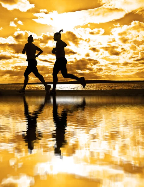 silhouettes of two women running - Stock Image - Everypixel