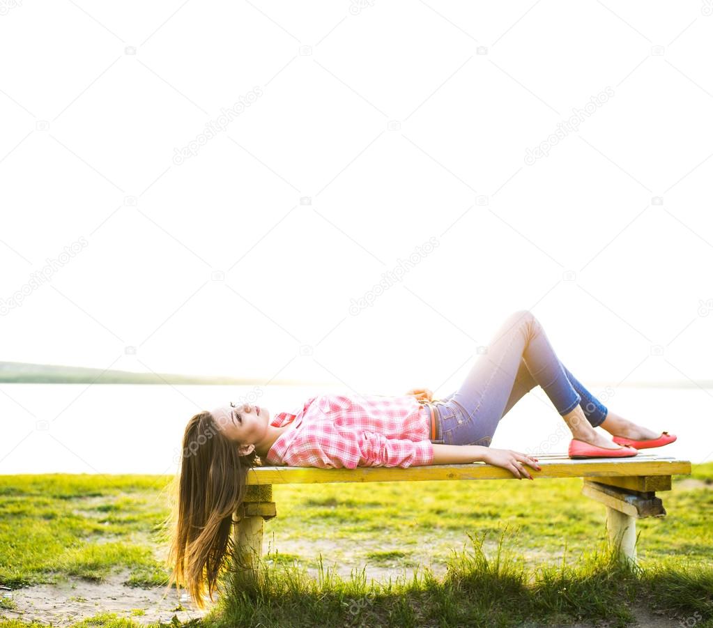 Woman lying on bench Stock Photo by ©borjomi88 114035202