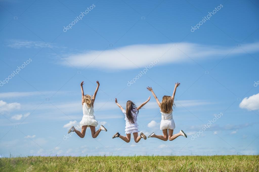 Women with Hands up jumping. Stock Photo by ©borjomi88 117217802